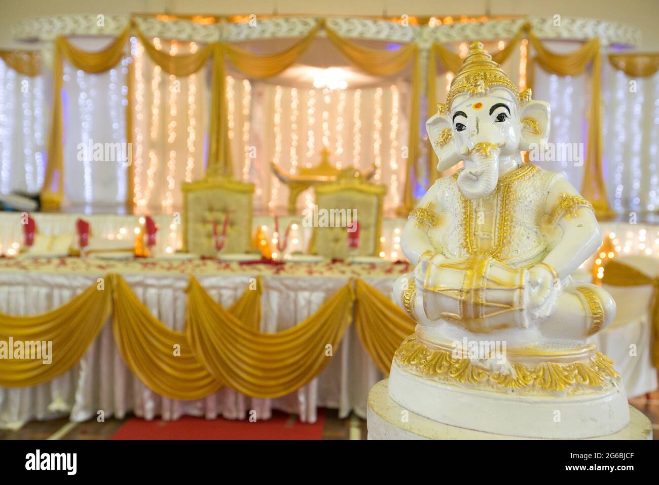 Statue of Hindu God Ganesha during a traditional wedding ceremony Stock ...