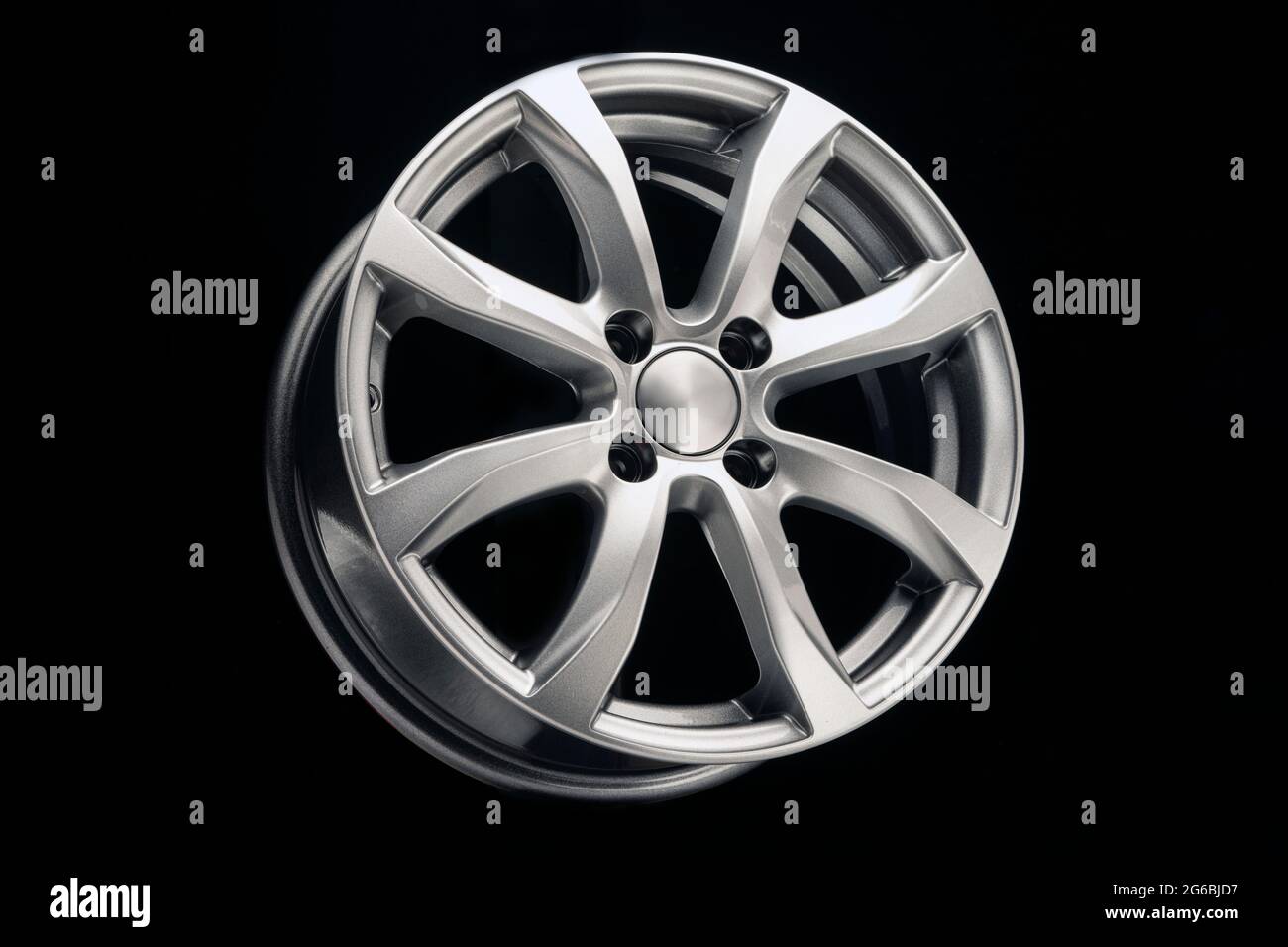 alloy wheel close up. silver metallic color on black background Stock ...