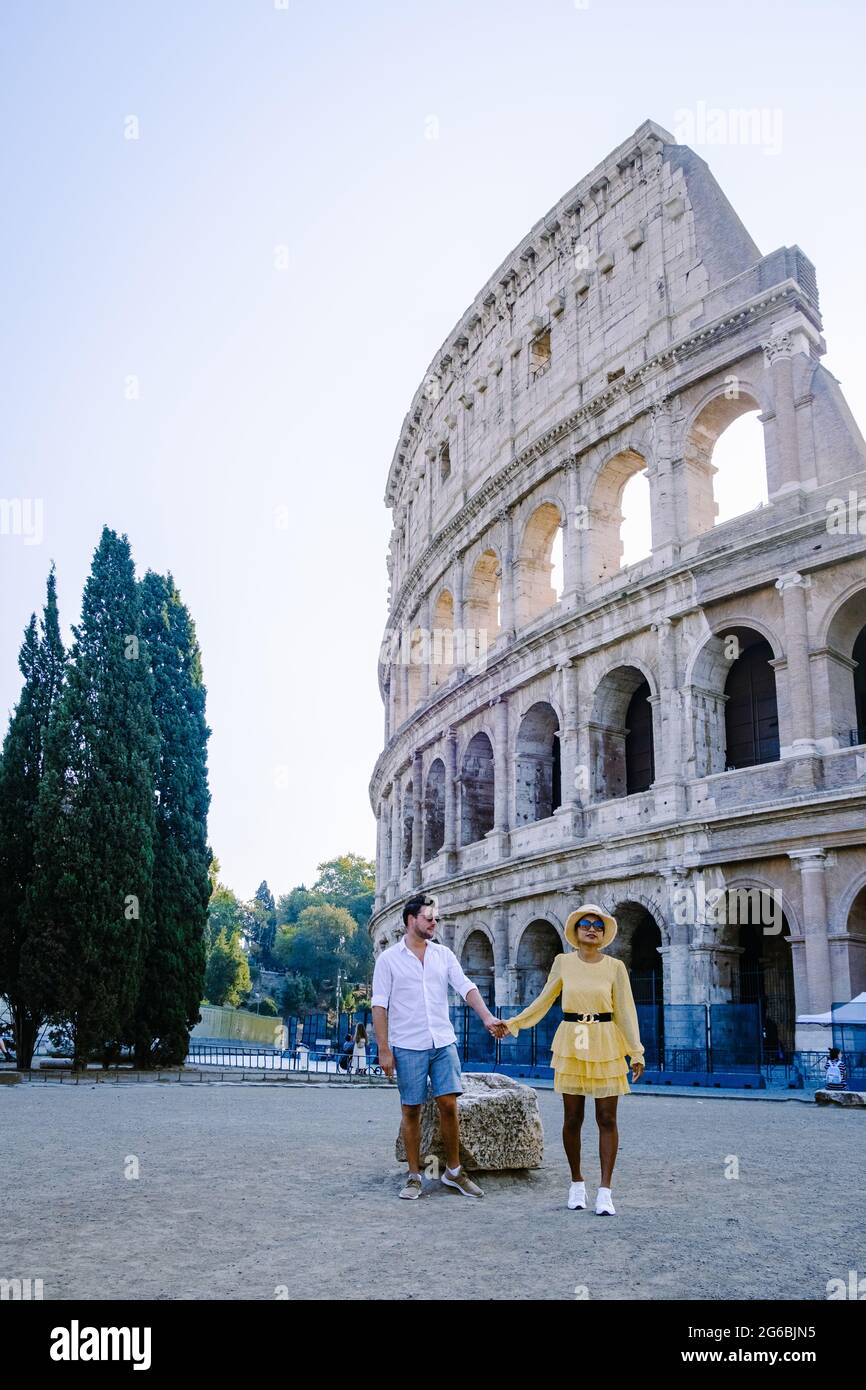 young couple mid age Asian woman and European man on a city trip in ...