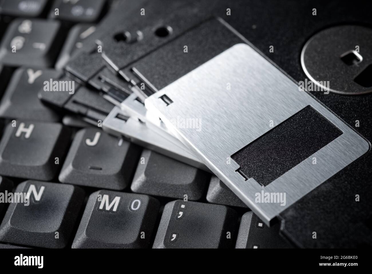Old floppy disks on a keyboard Stock Photo - Alamy