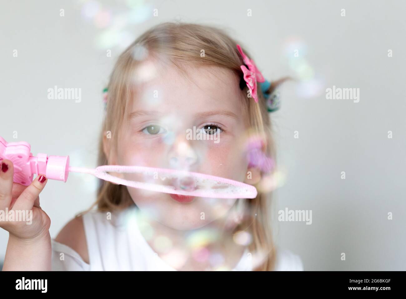 A child blows bubbles, children play with soap bubbles Stock Photo - Alamy