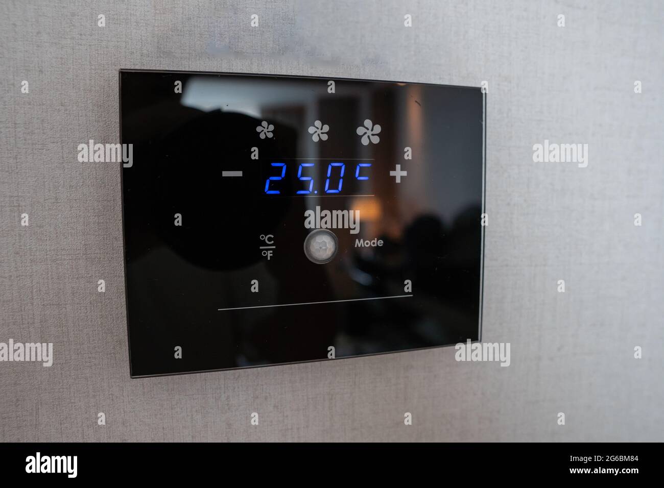 modern digital air condition panel on wall Stock Photo - Alamy