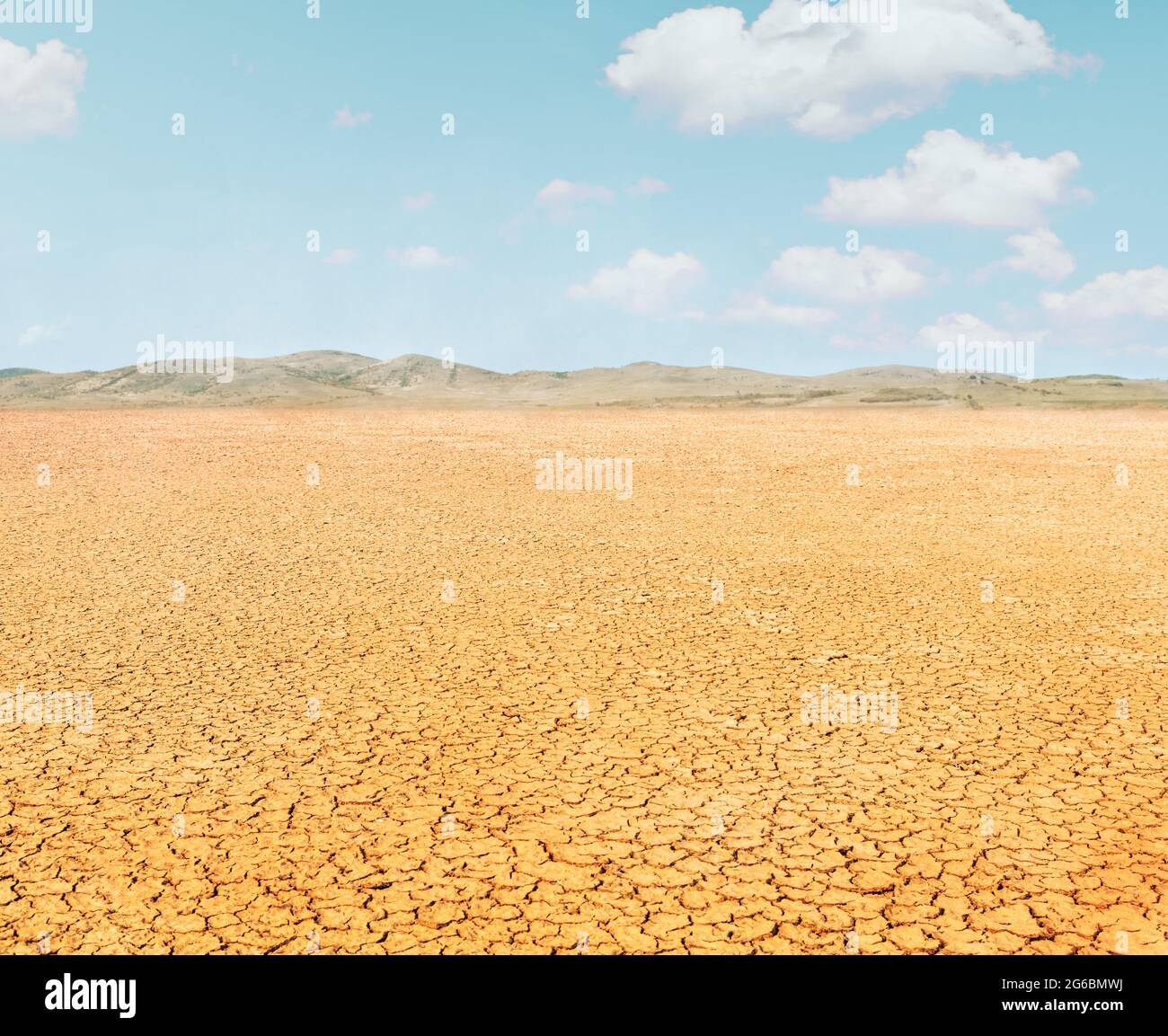 dry cracked dirt in desert landscape in Africa Stock Photo - Alamy