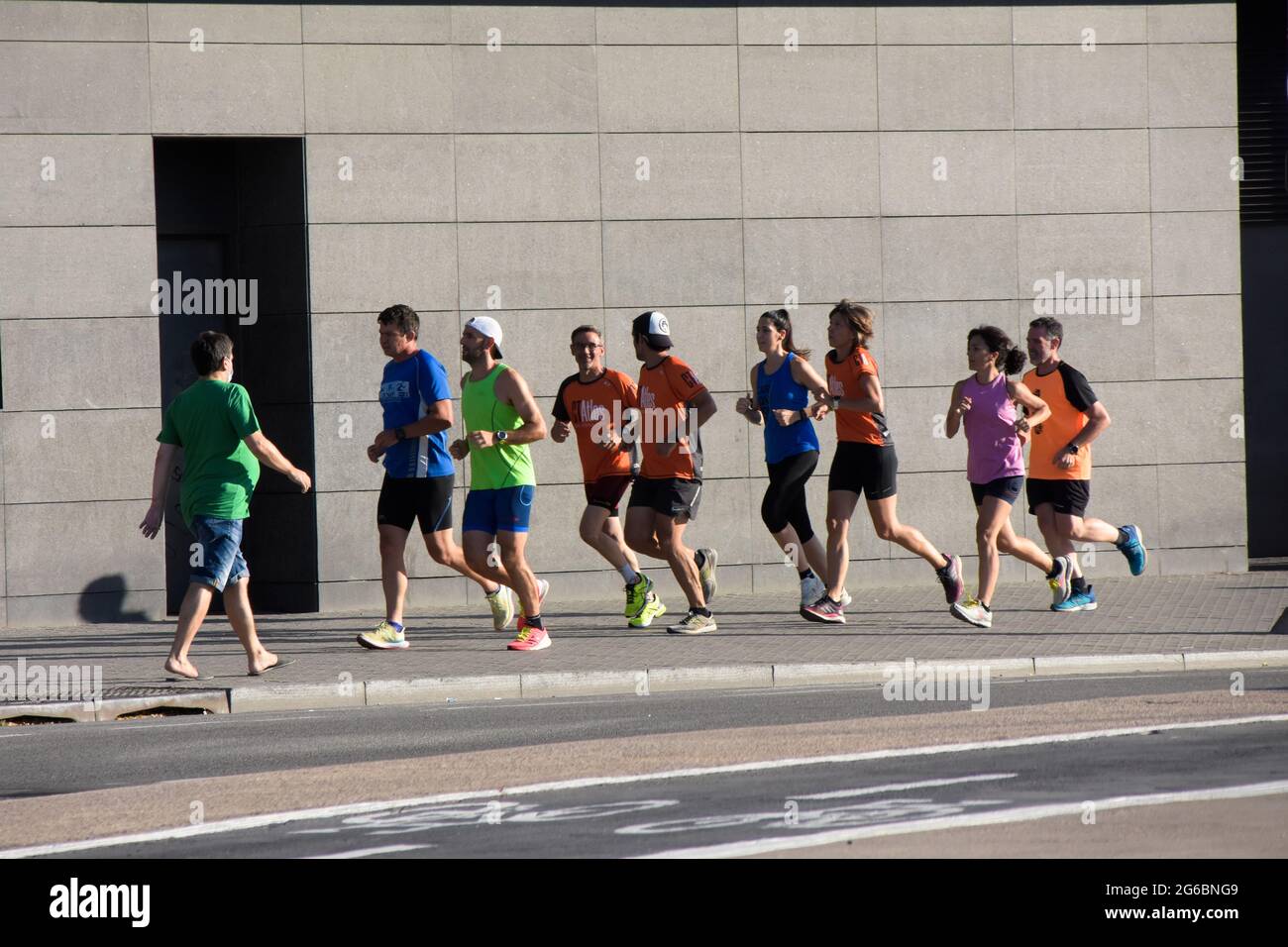 Group female runners road hi-res stock photography and images - Alamy