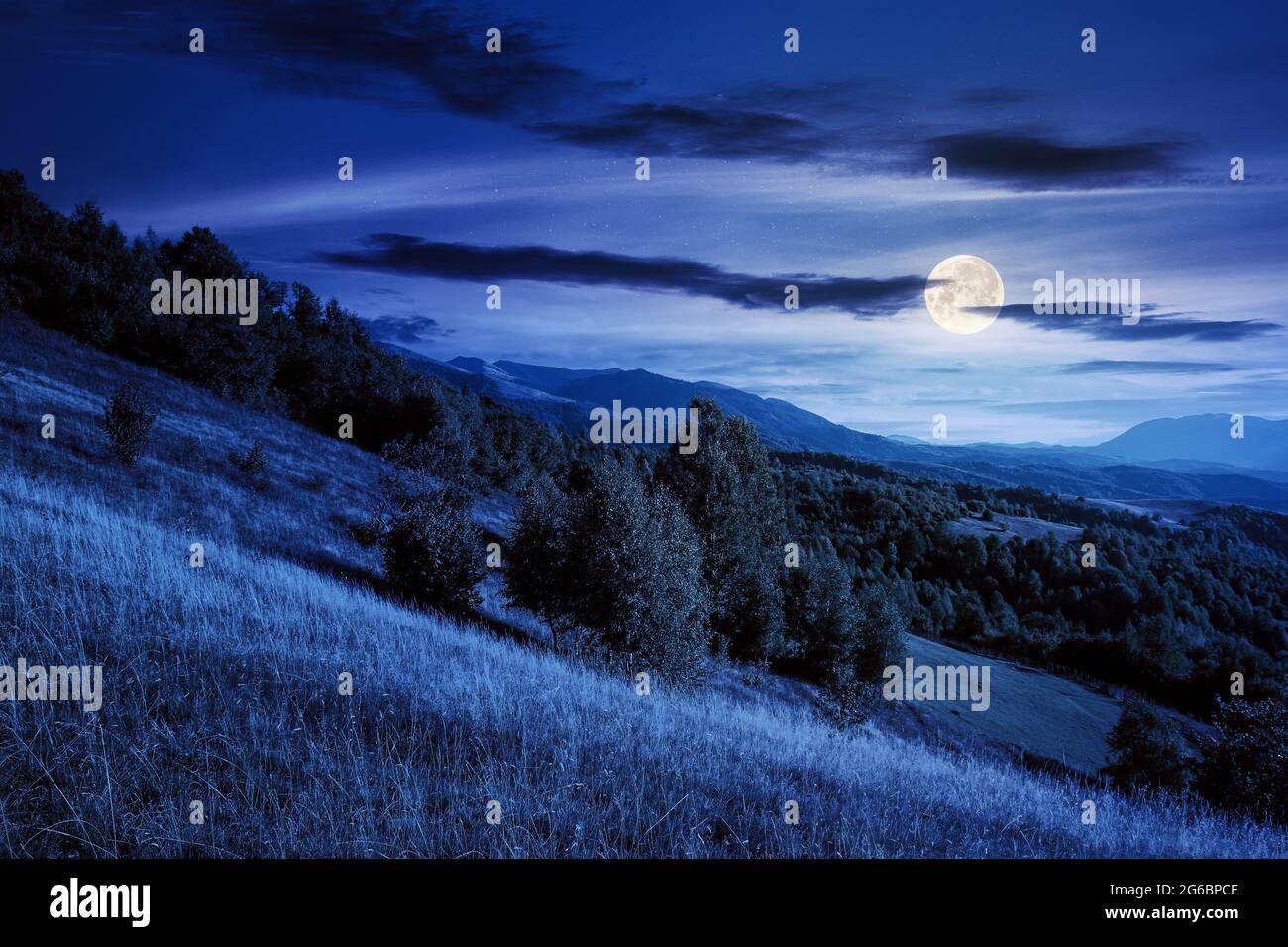 rural landscape at night. beautiful countryside scenery of carpathian ...