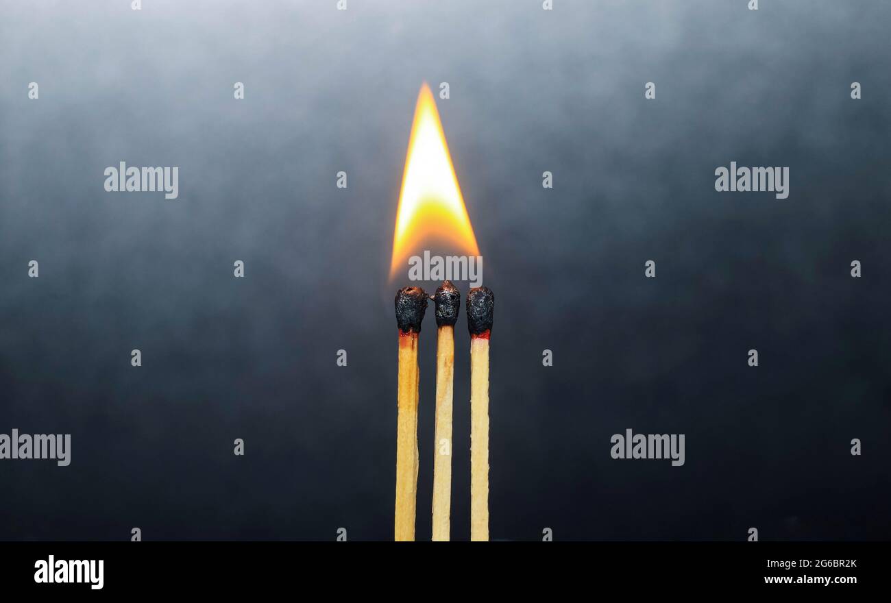 Group of a red match burning isolated with the background. Row burning ...