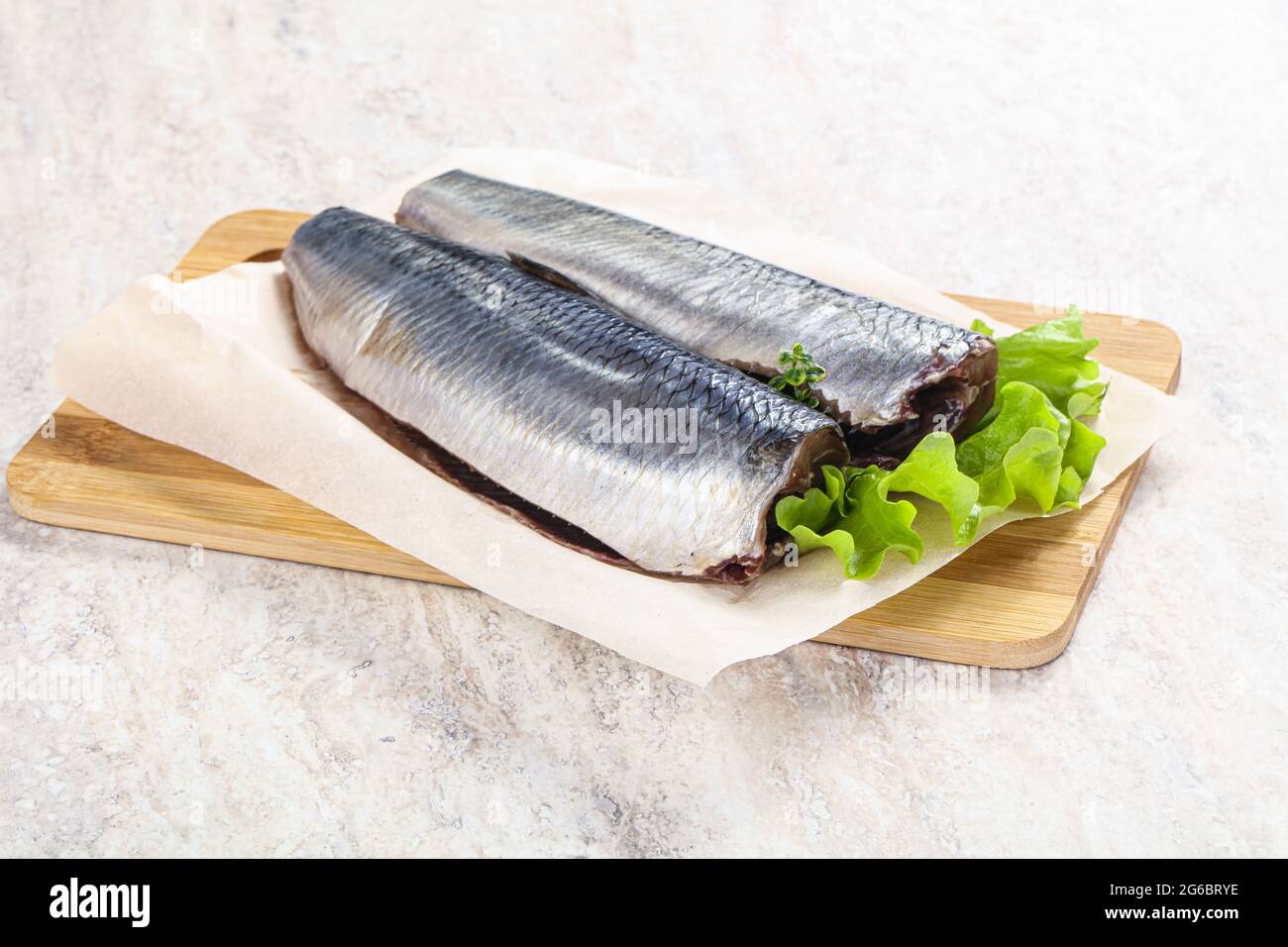 Marinated Herring fillet with skin for cooking Stock Photo - Alamy