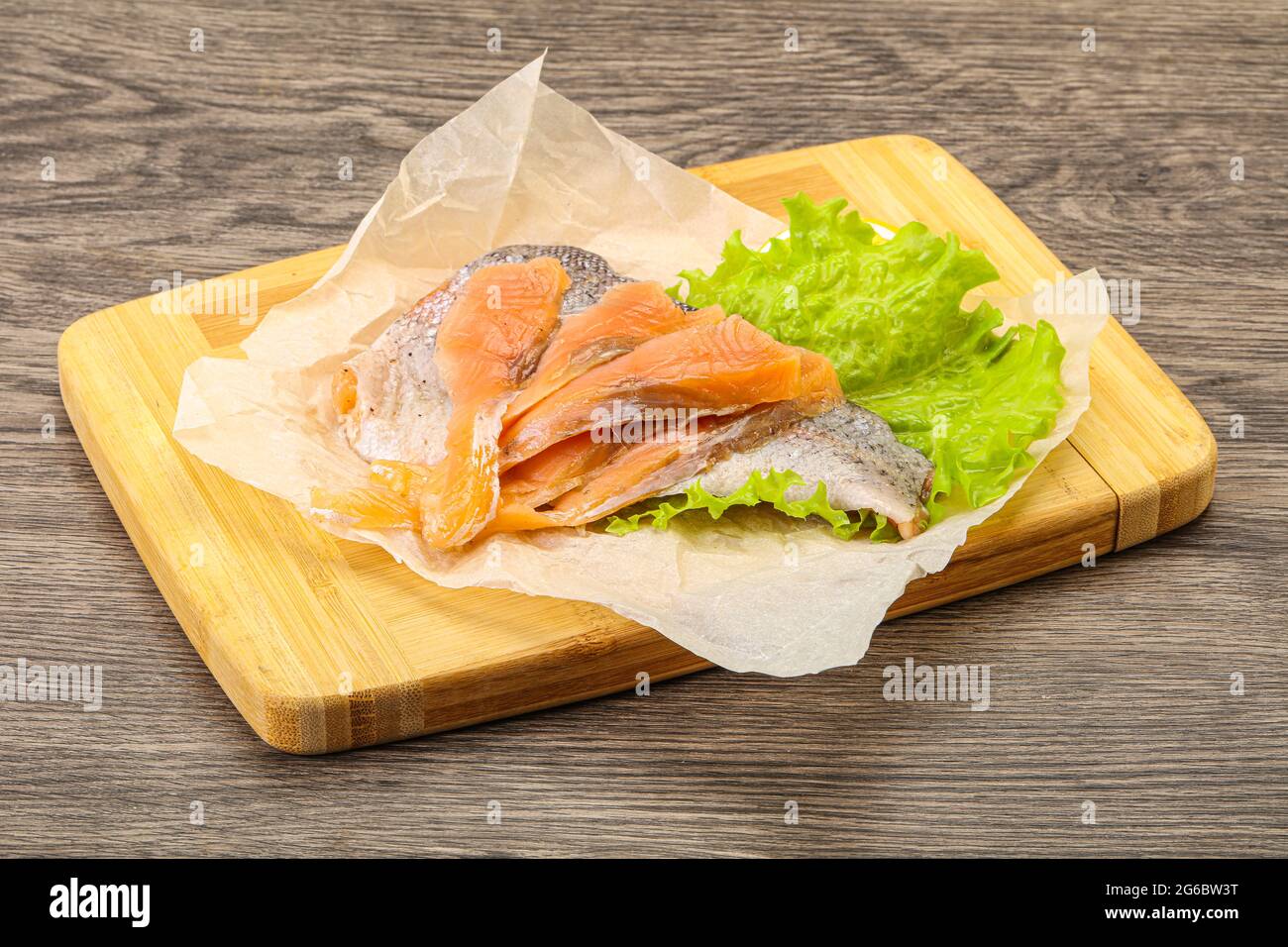 Sliced natural wild trout fillet over board Stock Photo - Alamy