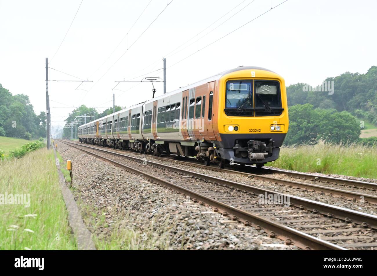 A passenger train going up the Lickey Incline approaching Vigo Bridge ...