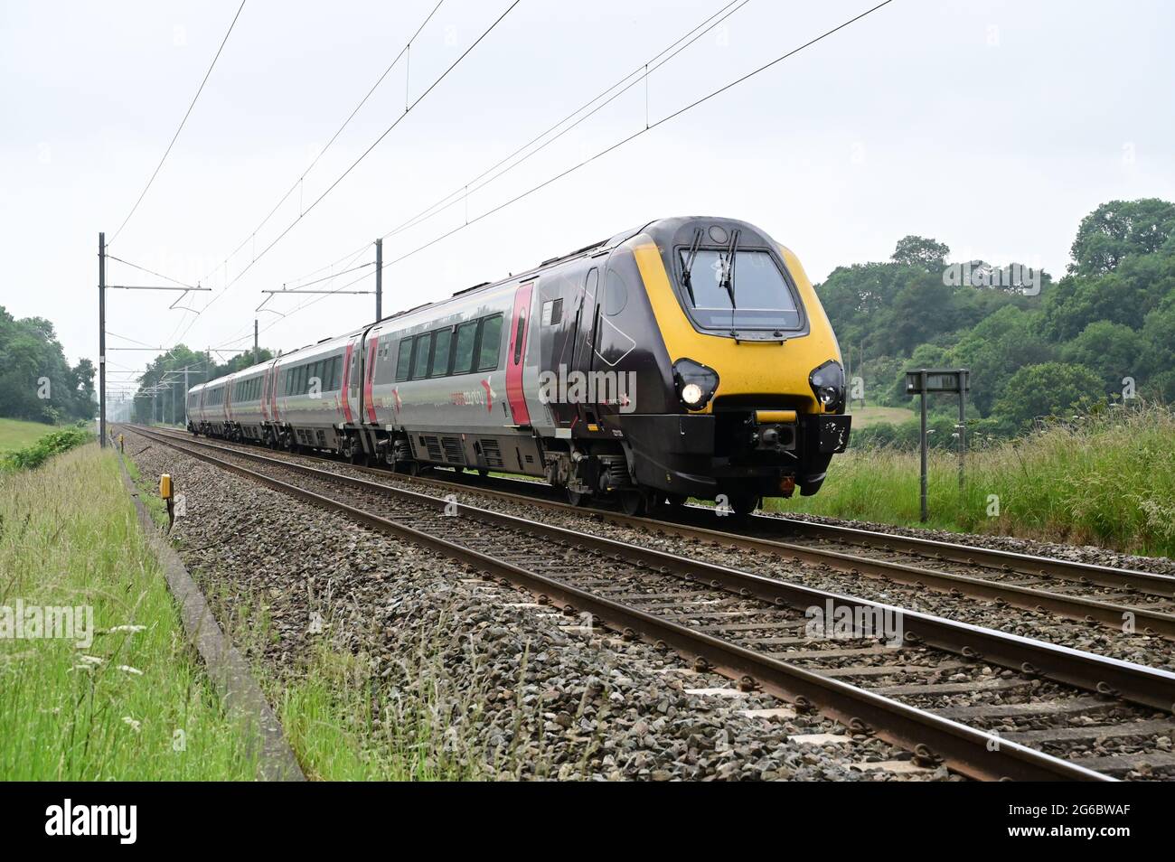 A passenger train going up the Lickey Incline approaching Vigo Bridge ...