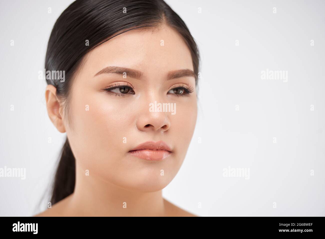 Emotionless young woman cannot smile after getting botox injections in ...