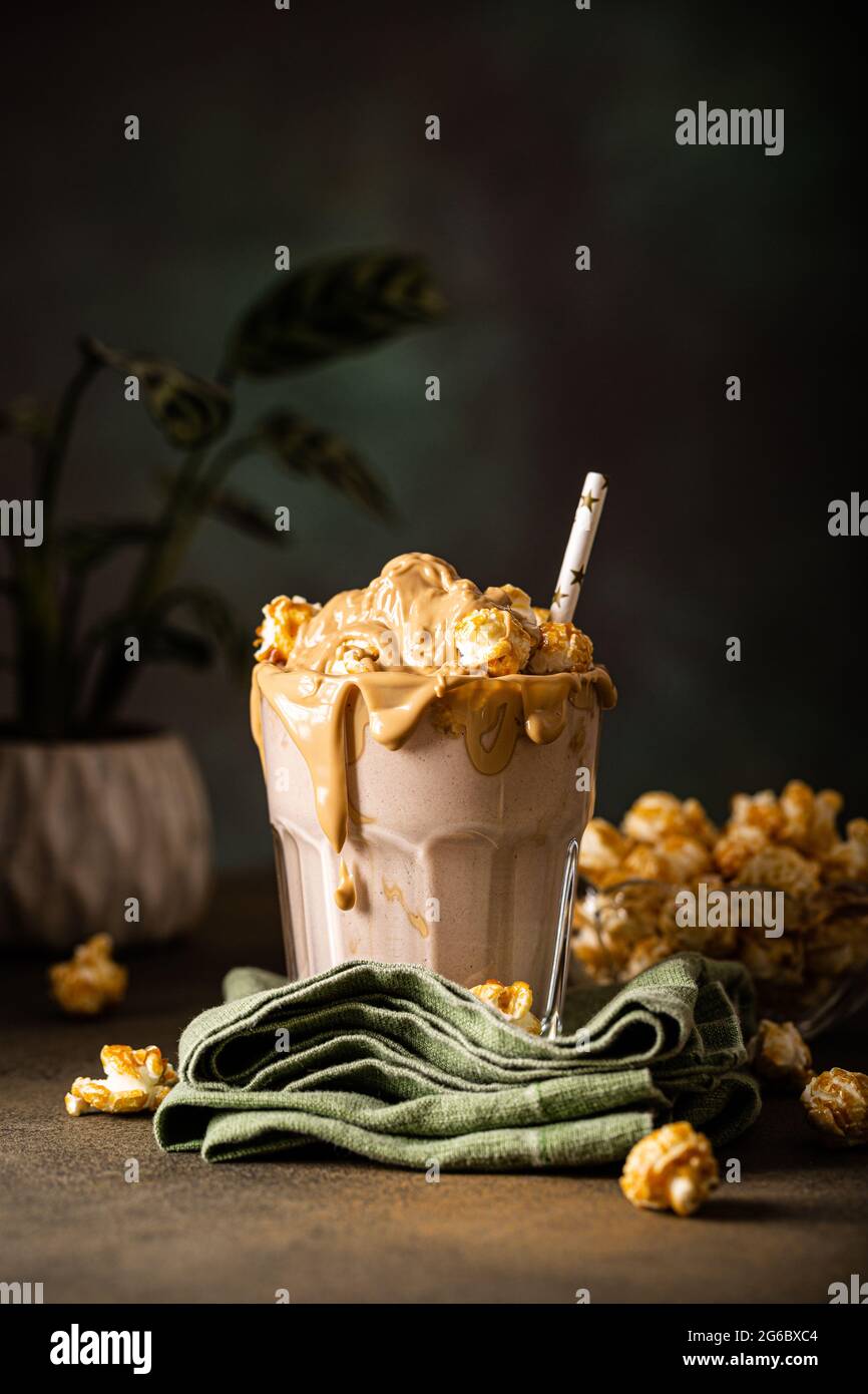 Popcorn milkshake with sea salt caramel Stock Photo - Alamy