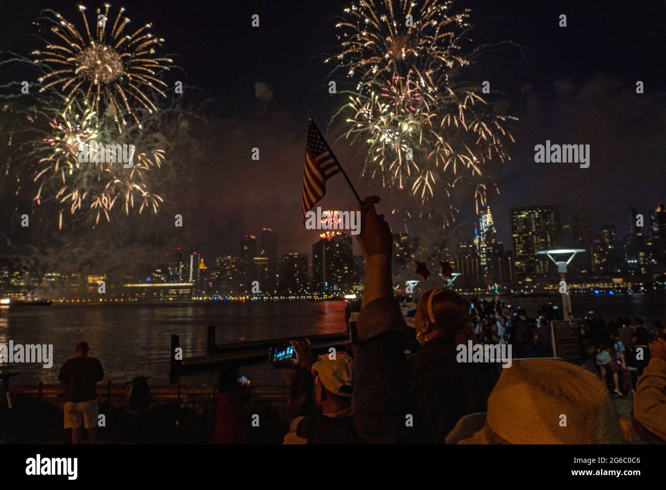 Spectators watch fireworks explode during the 45th annual Macy's 4th of ...