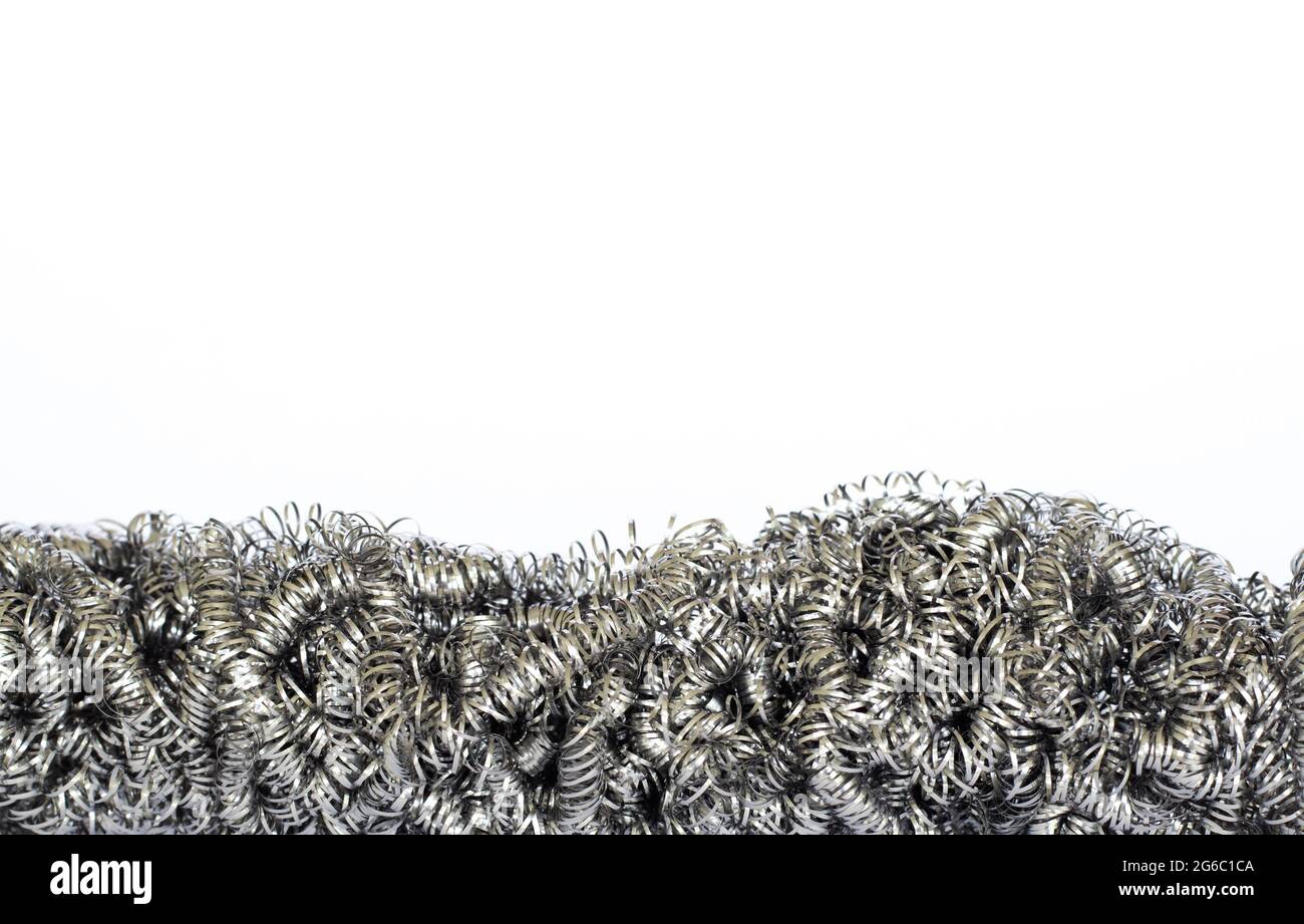 Stainless steel pot scrubber standout on white background, copy space ...