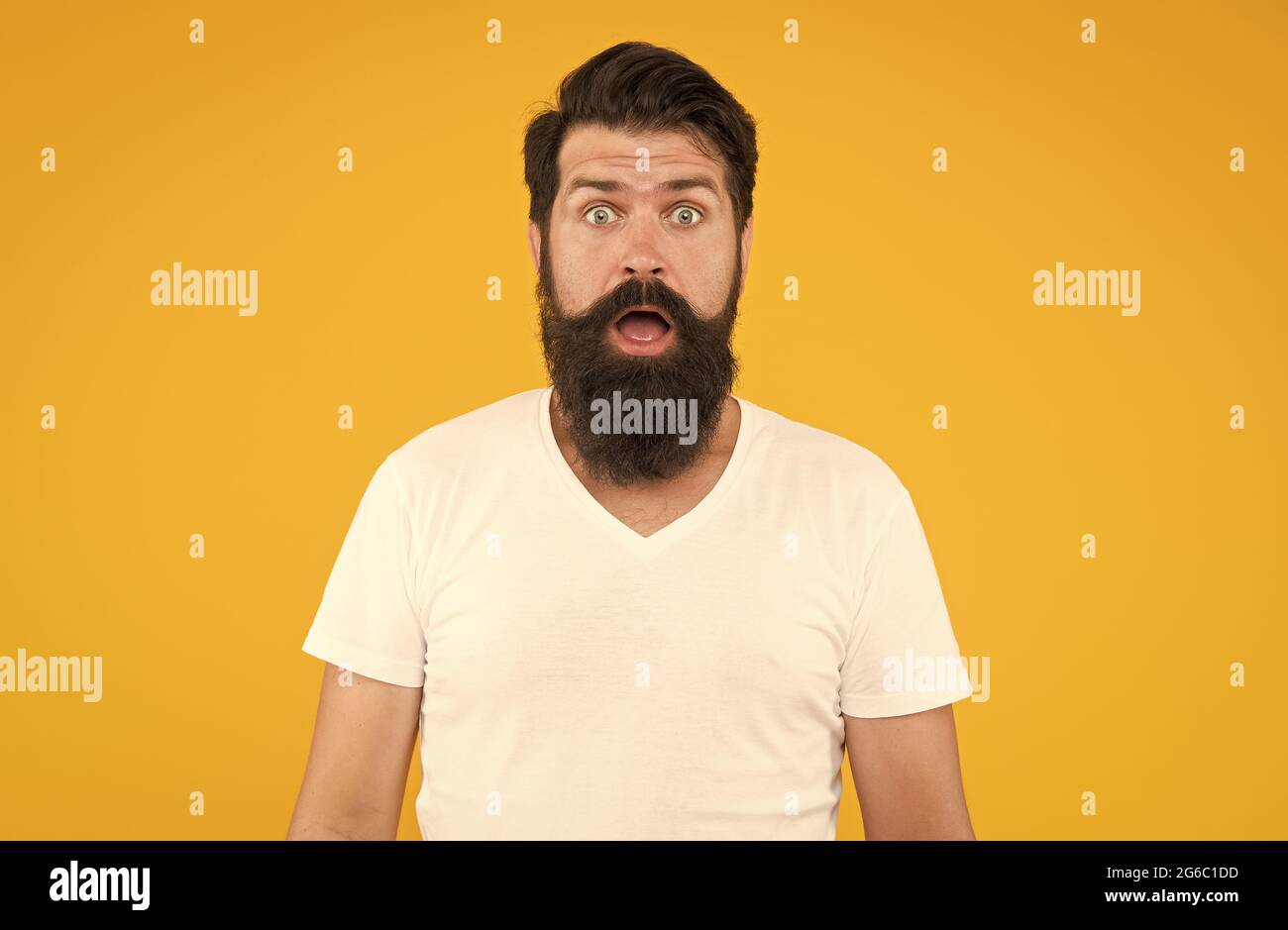 Surprised face expression bearded man yellow background, surprise ...
