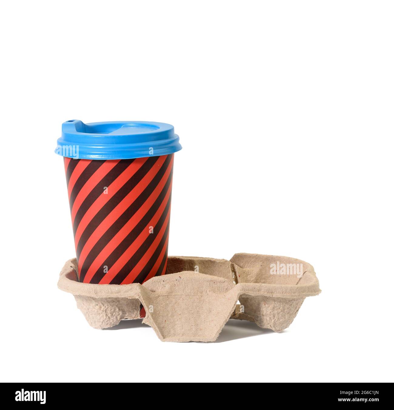 paper red striped disposable cup with plastic lid stands in paper ...