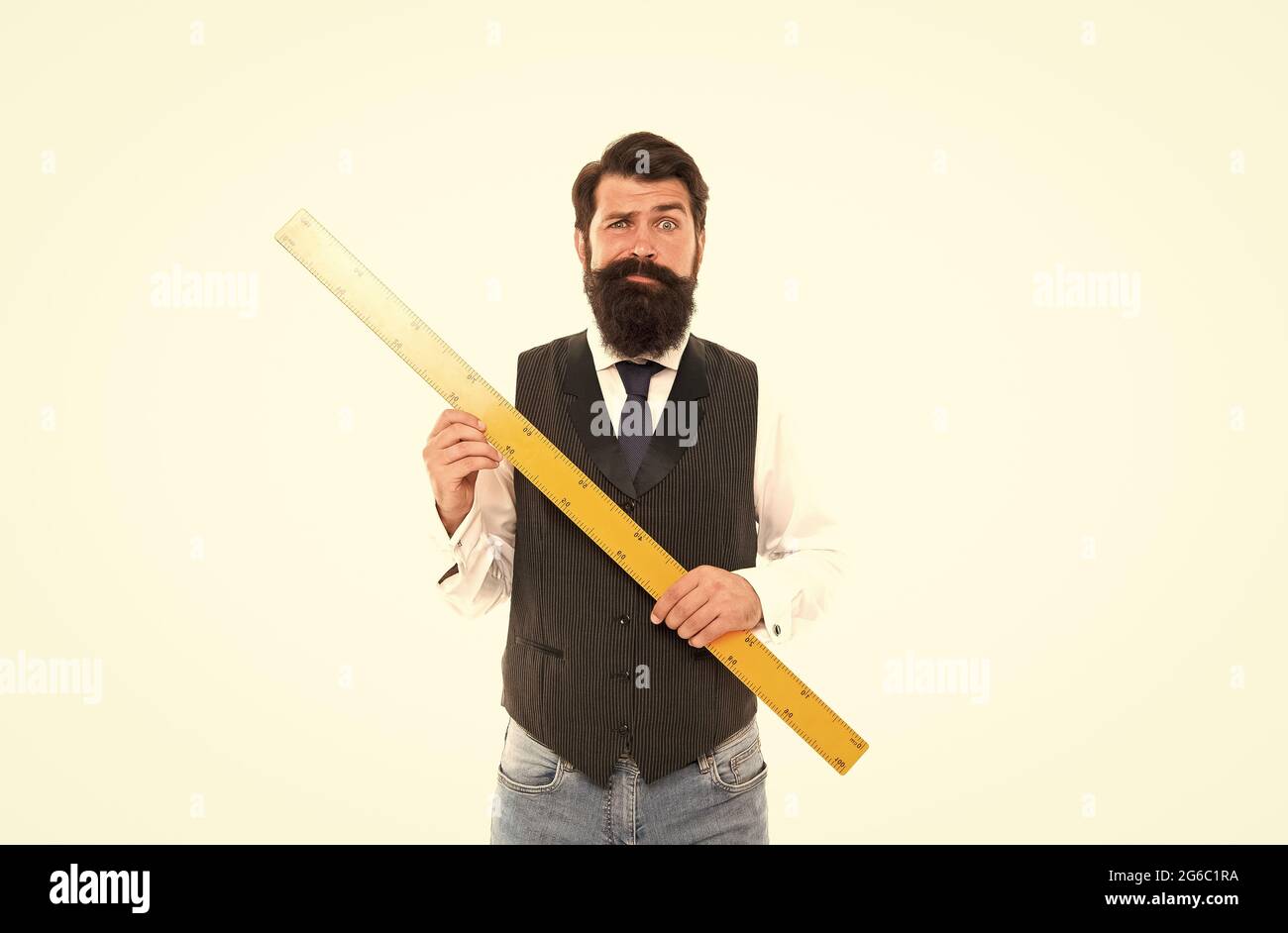 Bearded man hold ruler or line gauge for school lesson isolated on ...