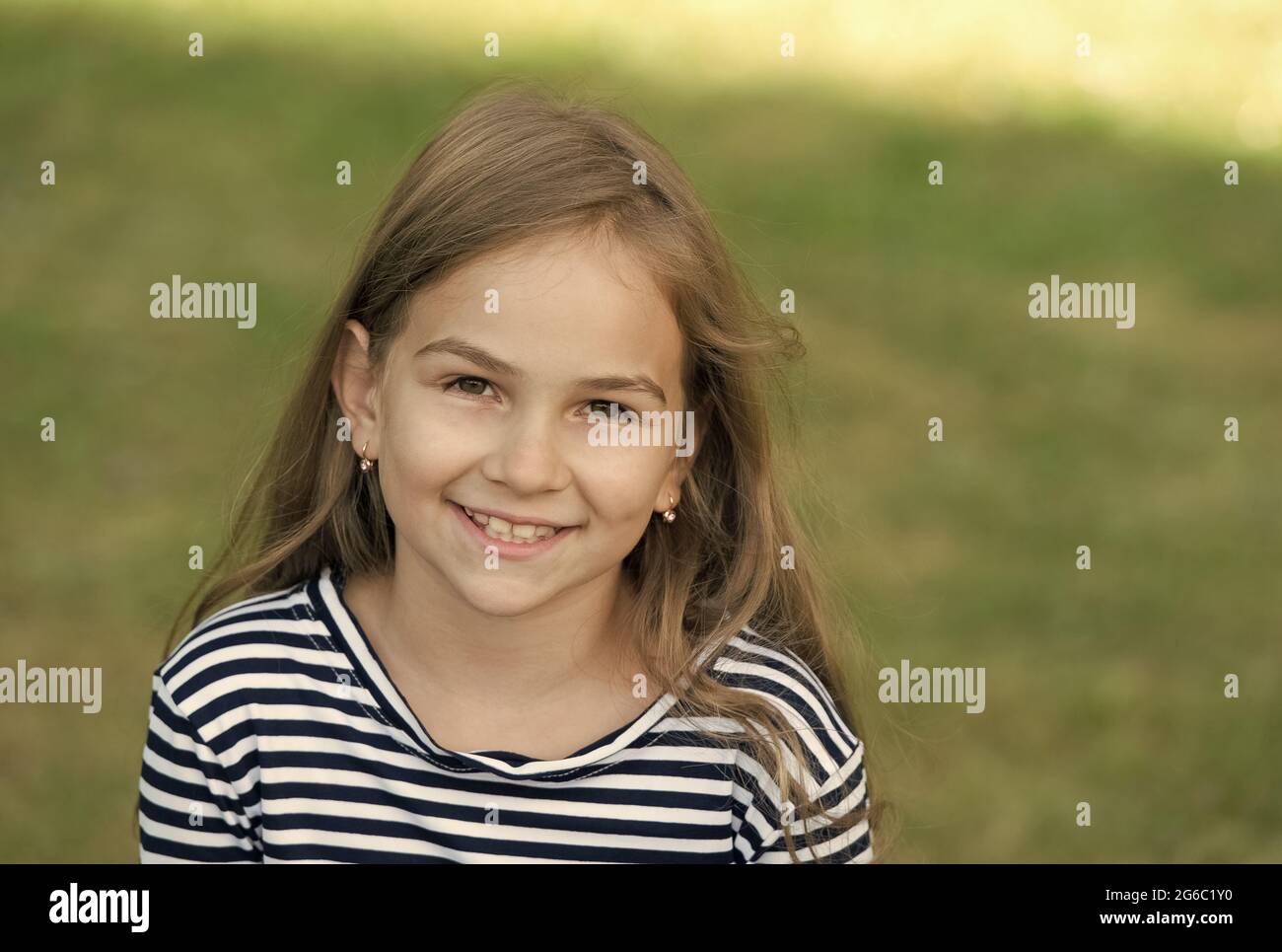 Smile that makes lasting impression. Happy child smile summer outdoors ...