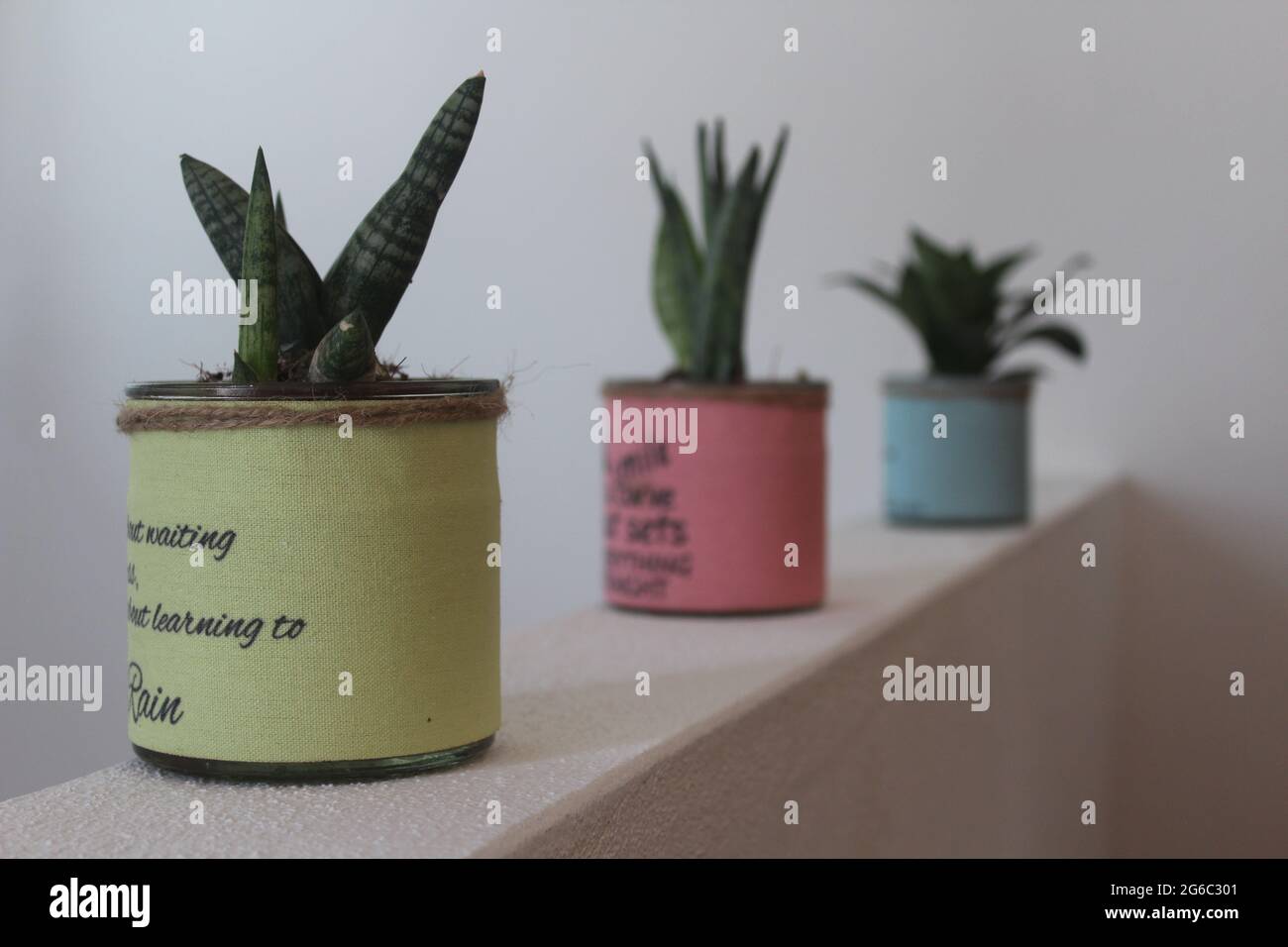 three colored vases Stock Photo - Alamy