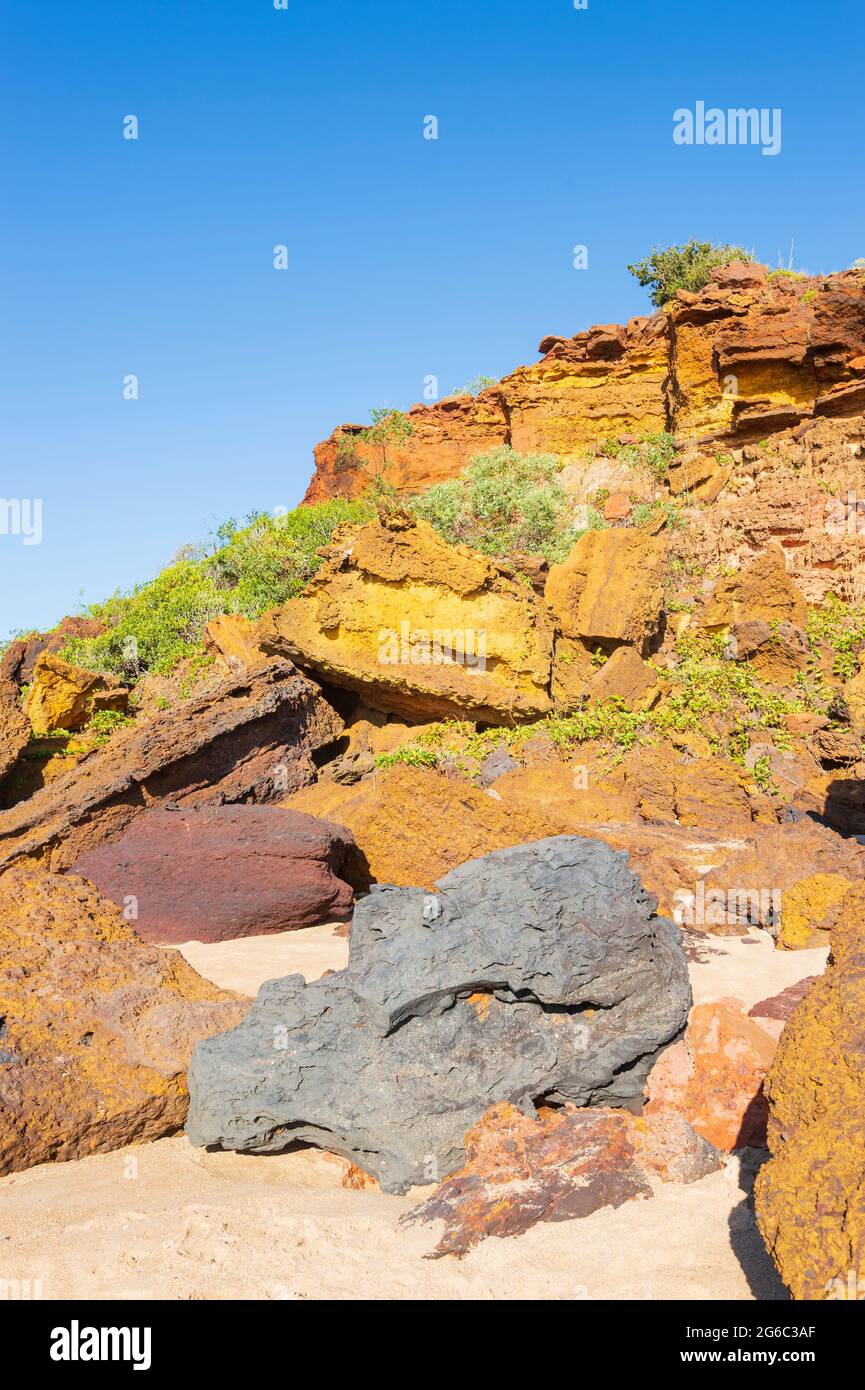 Vertical view of a colourful eroded Pindan cliff at Pender Bay Escape ...