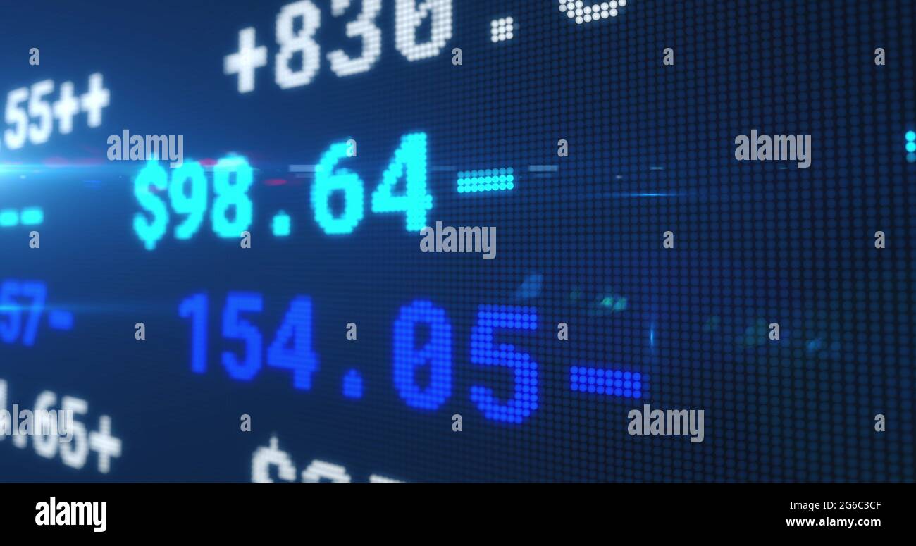 Image of stock exchange display board with numbers changing on blue ...