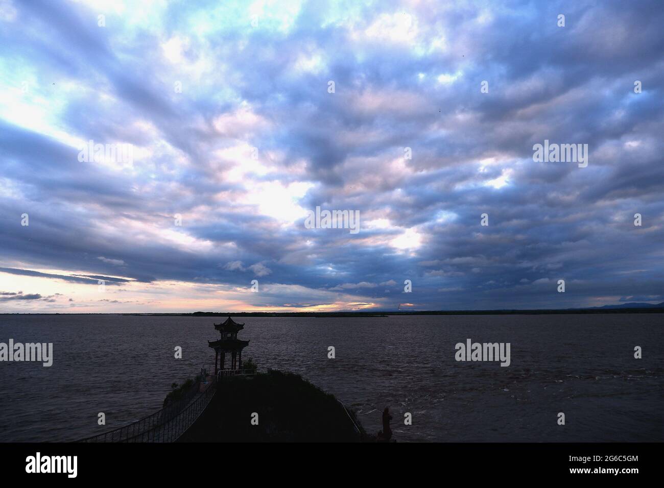 The sky over the Sino-Russian border Heilongjiang River was filled with ...