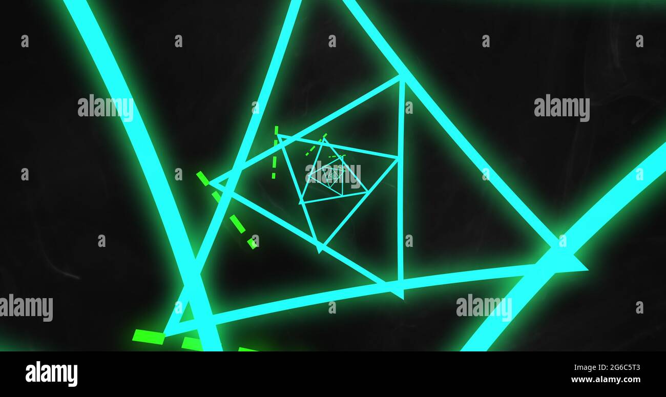 Multiple neon triangle shapes spinning against black background Stock Photo - Alamy