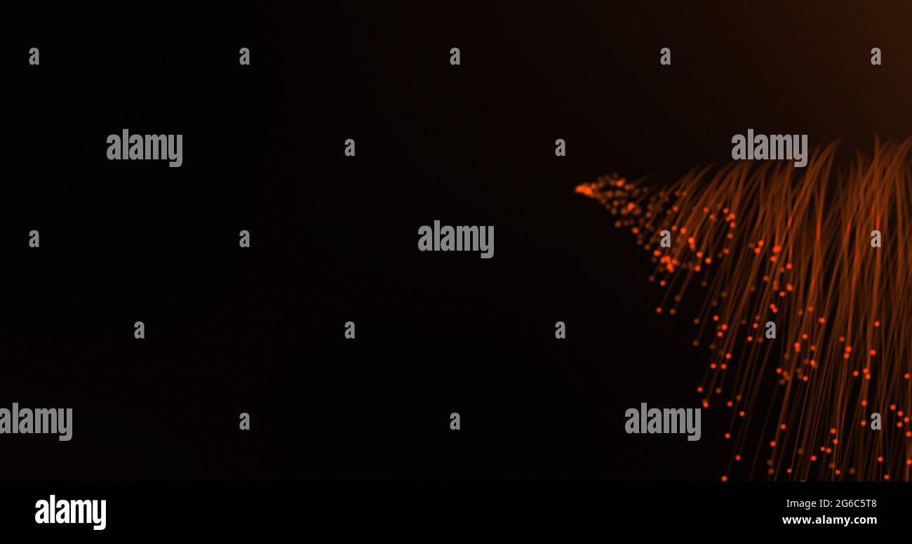 Orange light trails melting against against black background Stock ...