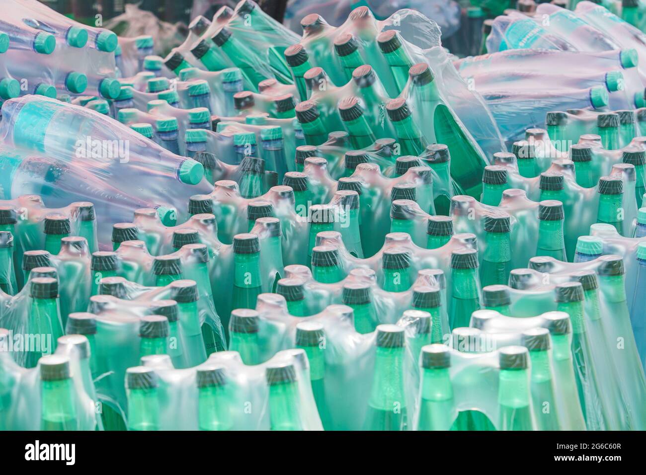 Plastic bottles of water wrapped in plastic membrane Stock Photo - Alamy