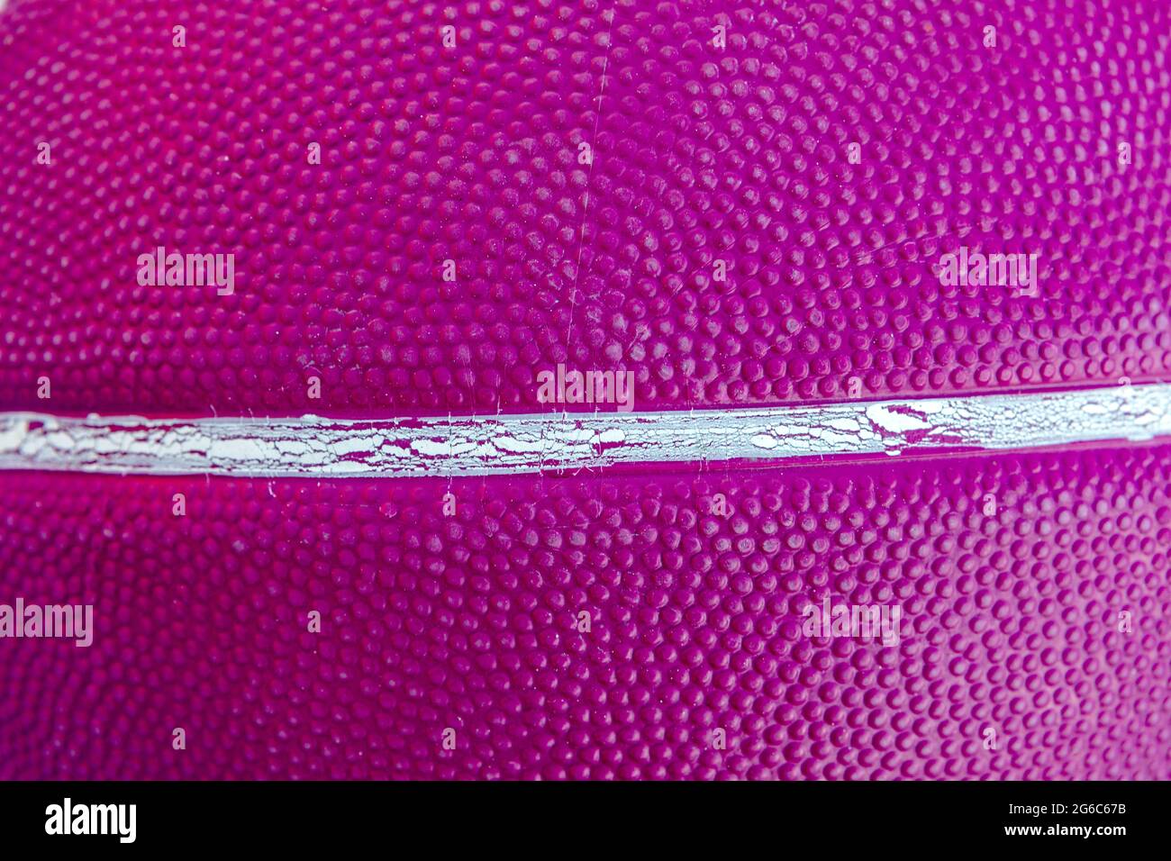 Texture of a basketball ball with a violet color close up Stock Photo ...