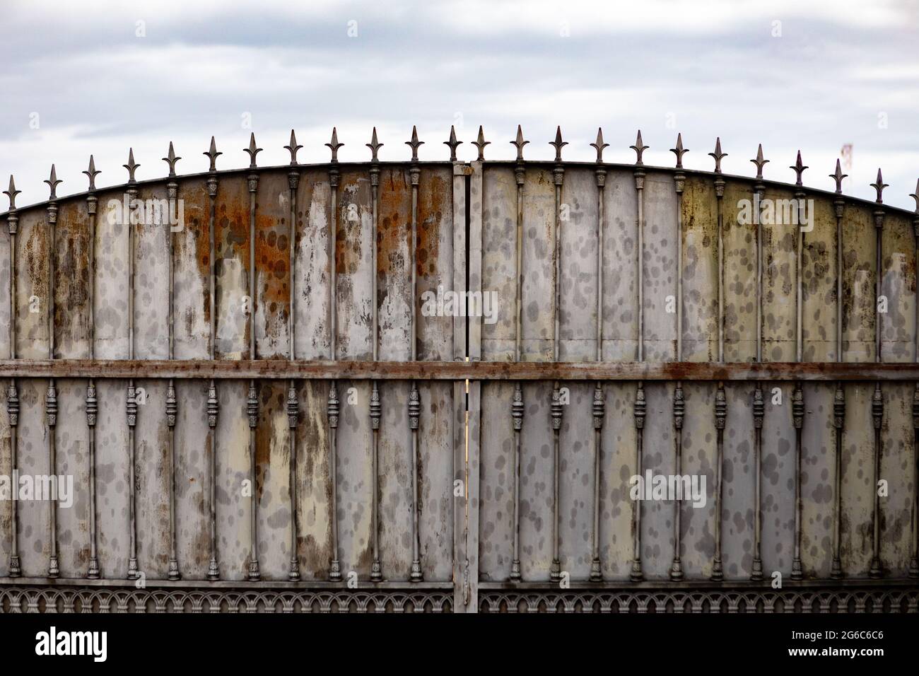 Old rusty gate in an abandoned house. Broken gate Stock Photo - Alamy