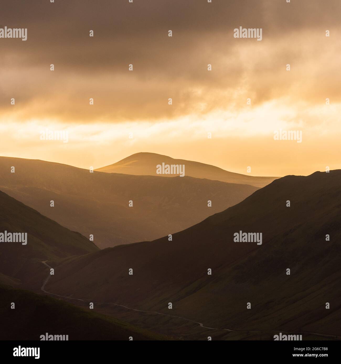 Sunset from the top of Catbells looking through the valley of Little ...