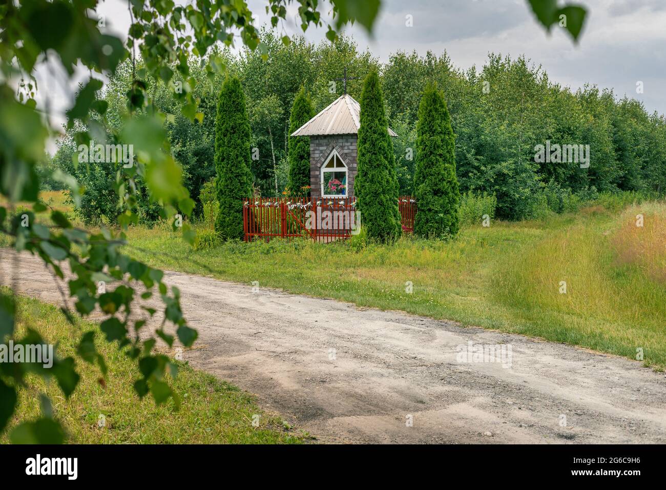 Crossroads at the chapel. Landscape of Polish countryside. Recreation ...