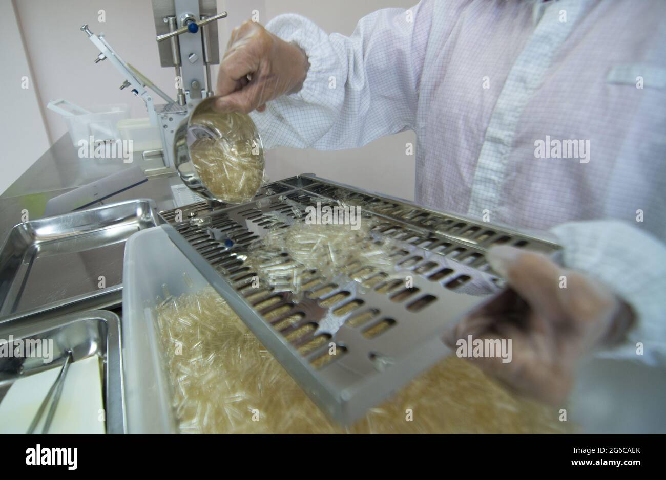 Laboratory equipment for making soft gel capsule Stock Photo - Alamy