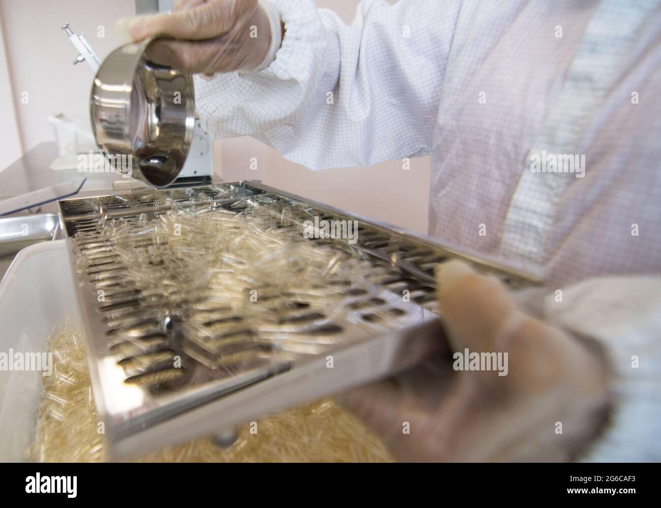 Laboratory equipment for making soft gel capsule Stock Photo - Alamy