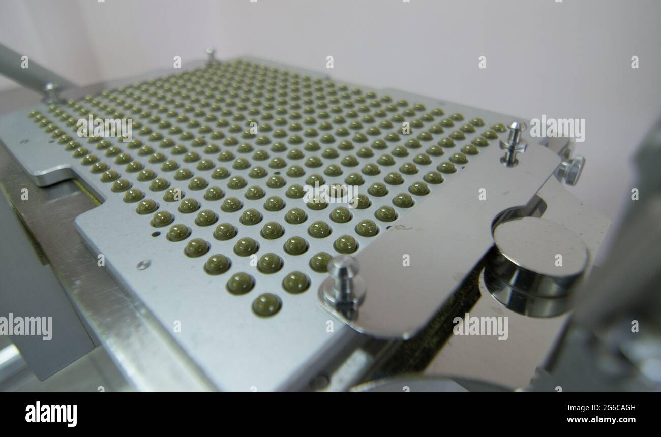 Laboratory equipment for making soft gel capsule Stock Photo - Alamy