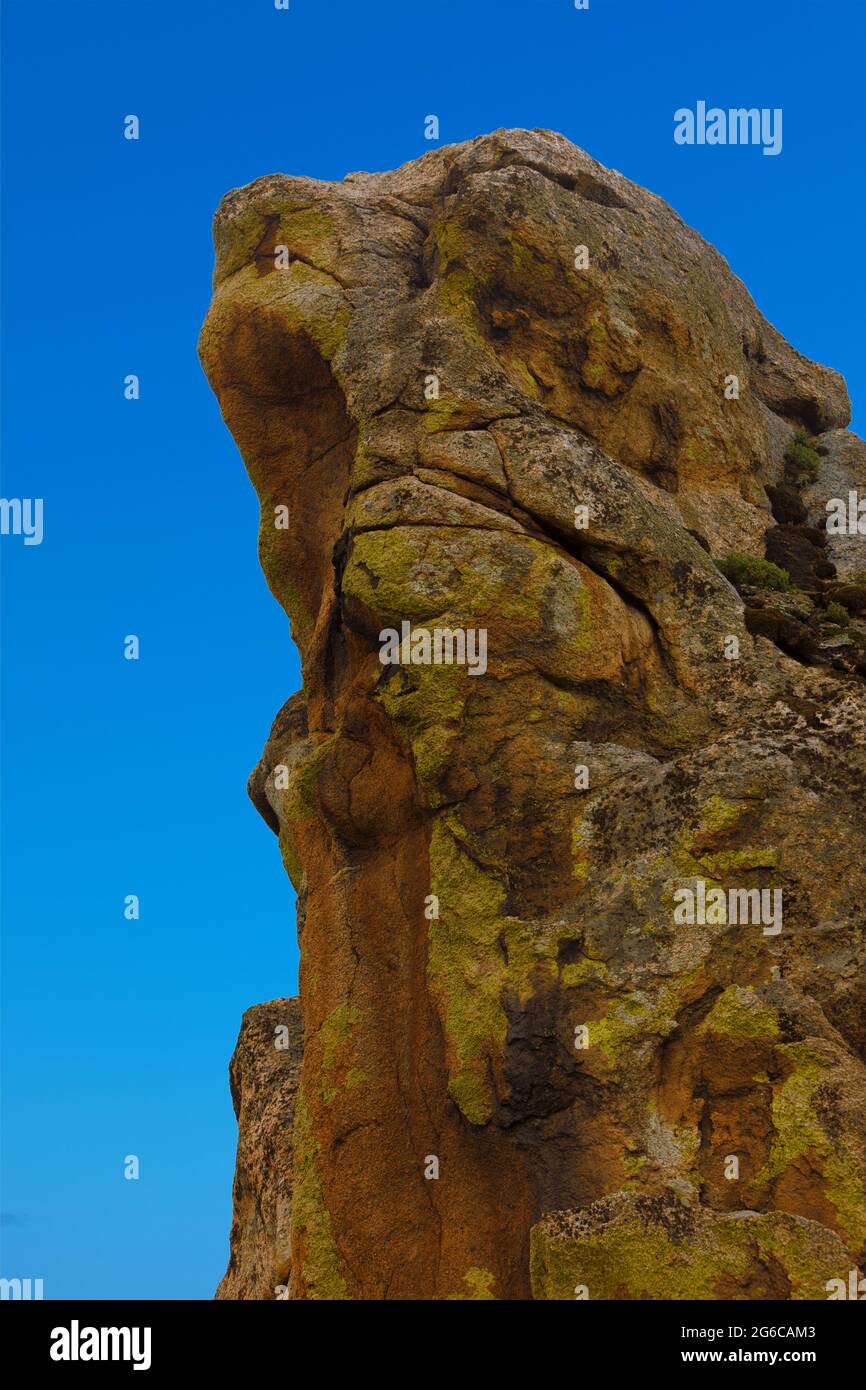 rock against background of blue sky. Russia Stock Photo - Alamy
