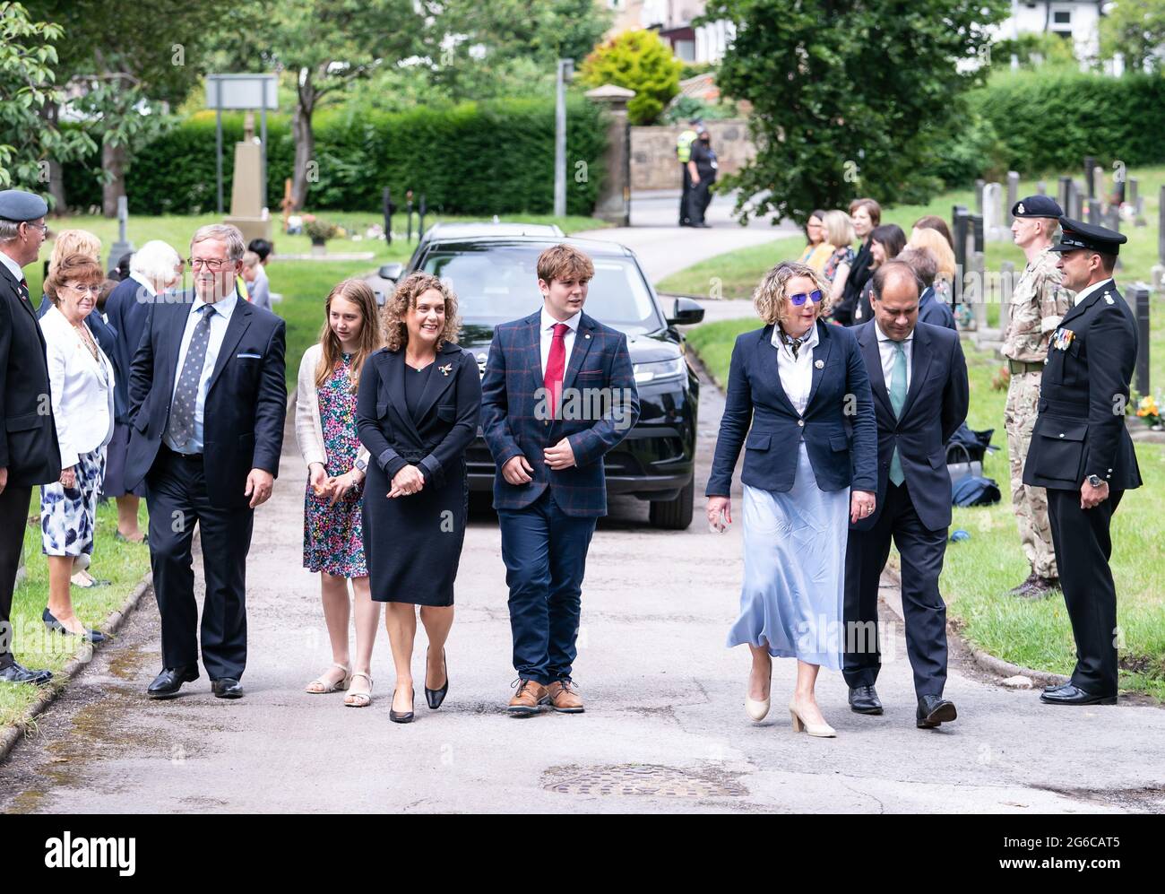 Relatives of Captain Sir Tom Moore (left to right) Colin Ingram-Moore ...