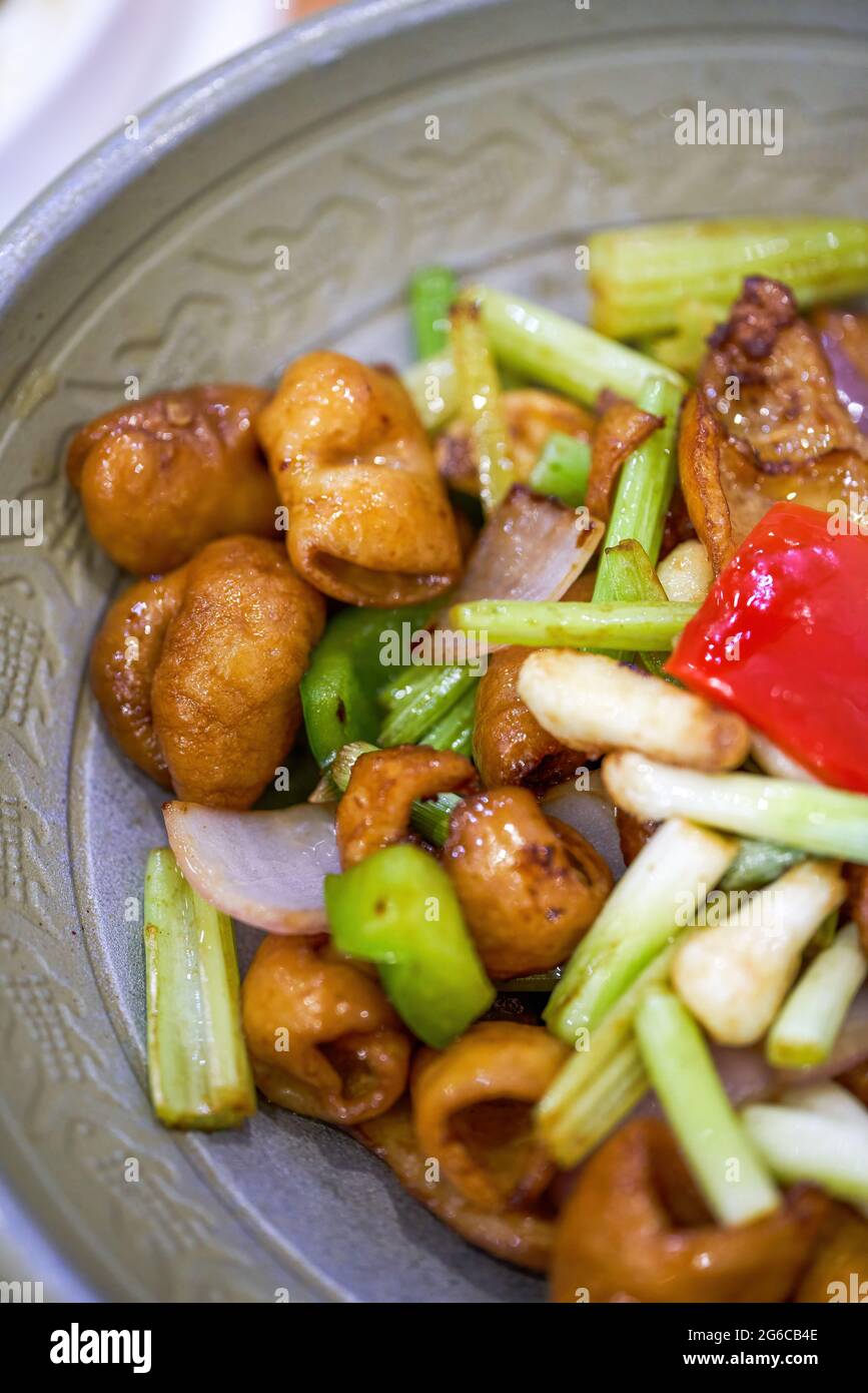 A delicious Chinese dish, fried pork intestines Stock Photo - Alamy