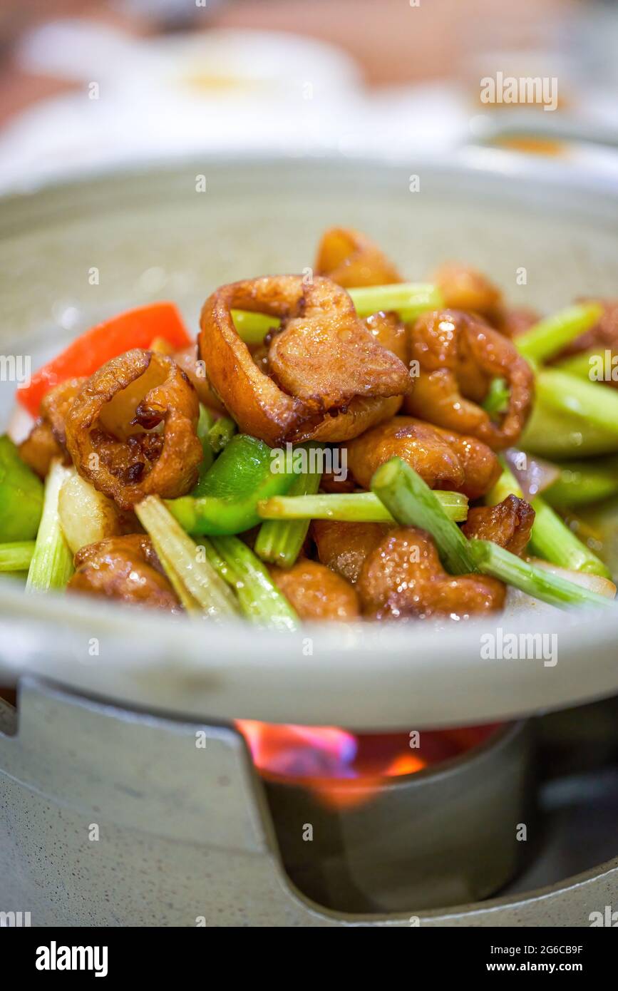 A delicious Chinese dish, fried pork intestines Stock Photo - Alamy