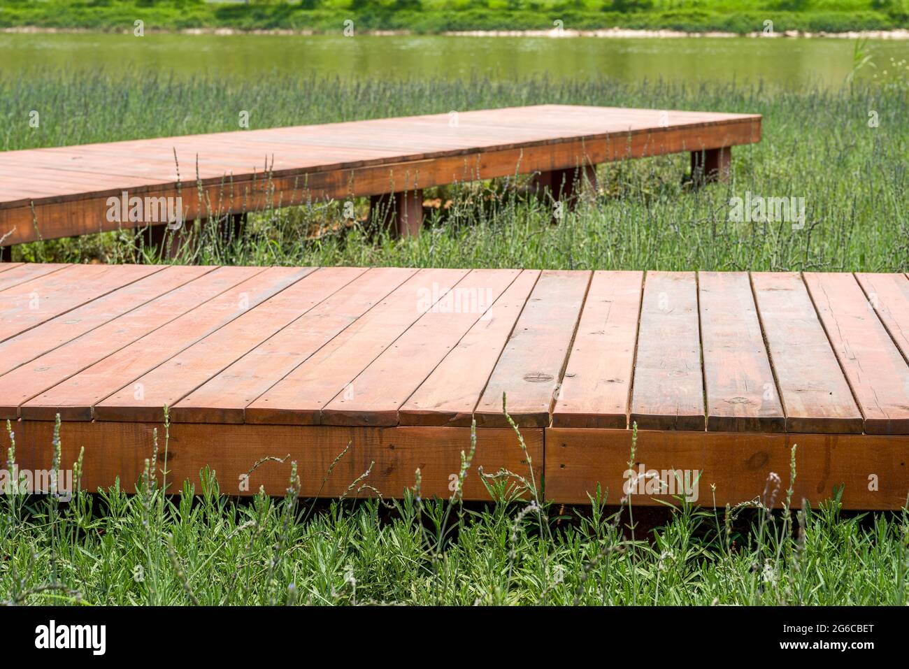 Walk along the water corridor by the lake in the park, and the footpath ...