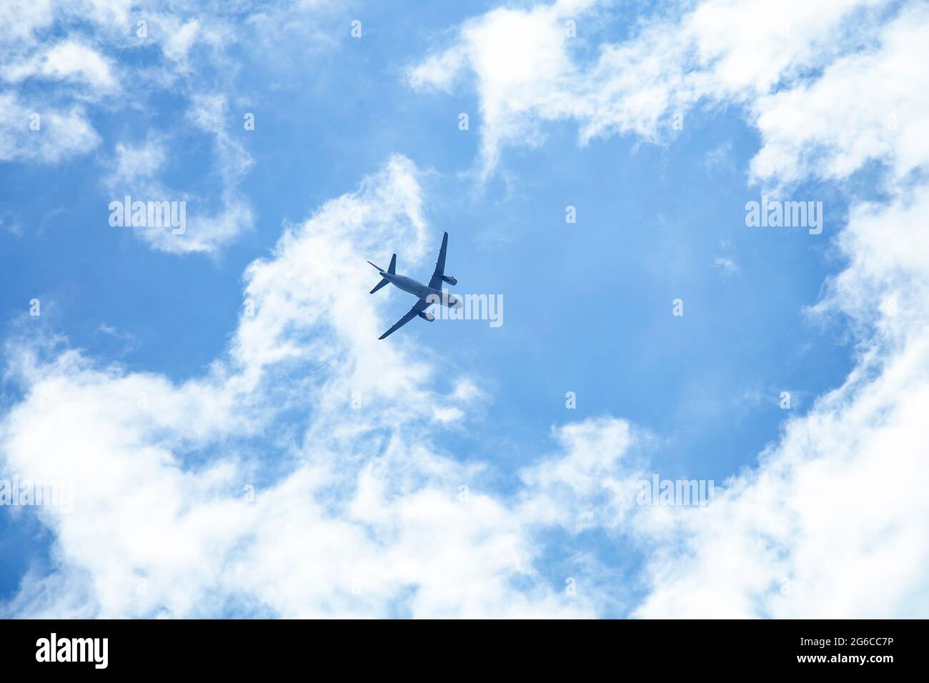 Airplane flying to the sky Stock Photo - Alamy