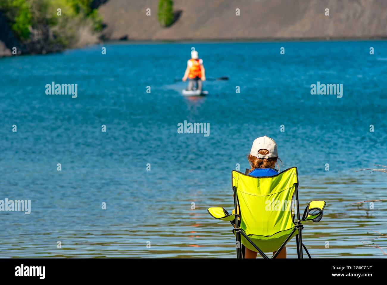 Rear view child girl chair hi-res stock photography and images - Alamy