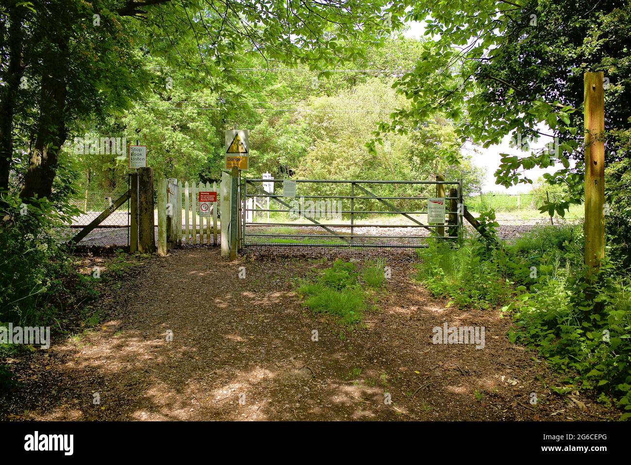 Pedestrian level crossing of railway tracks Stock Photo - Alamy