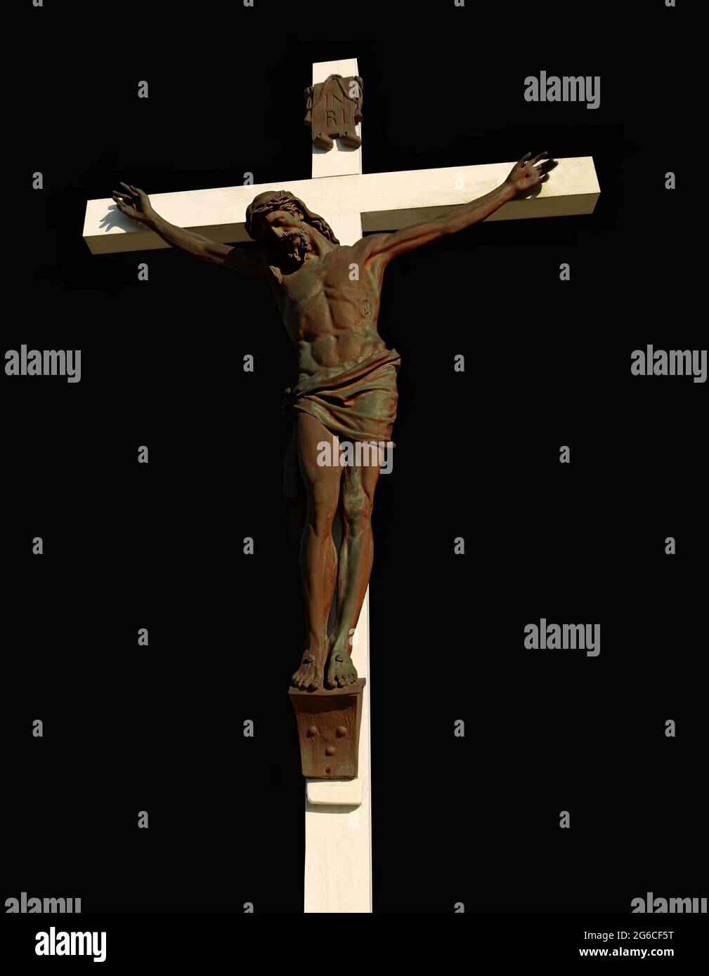 Closeup crucifix with metal body of Jesus Christ isolated on black ...