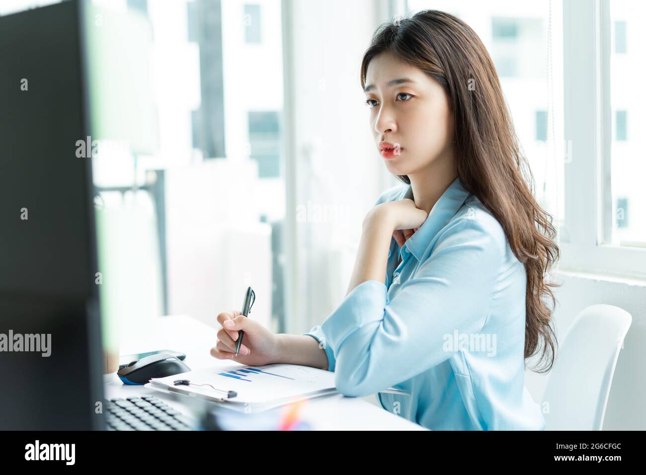 Portrait of young Asian businesswoman at work Stock Photo - Alamy
