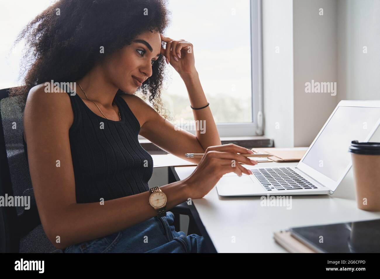 Curious office worker dealing with new task Stock Photo - Alamy