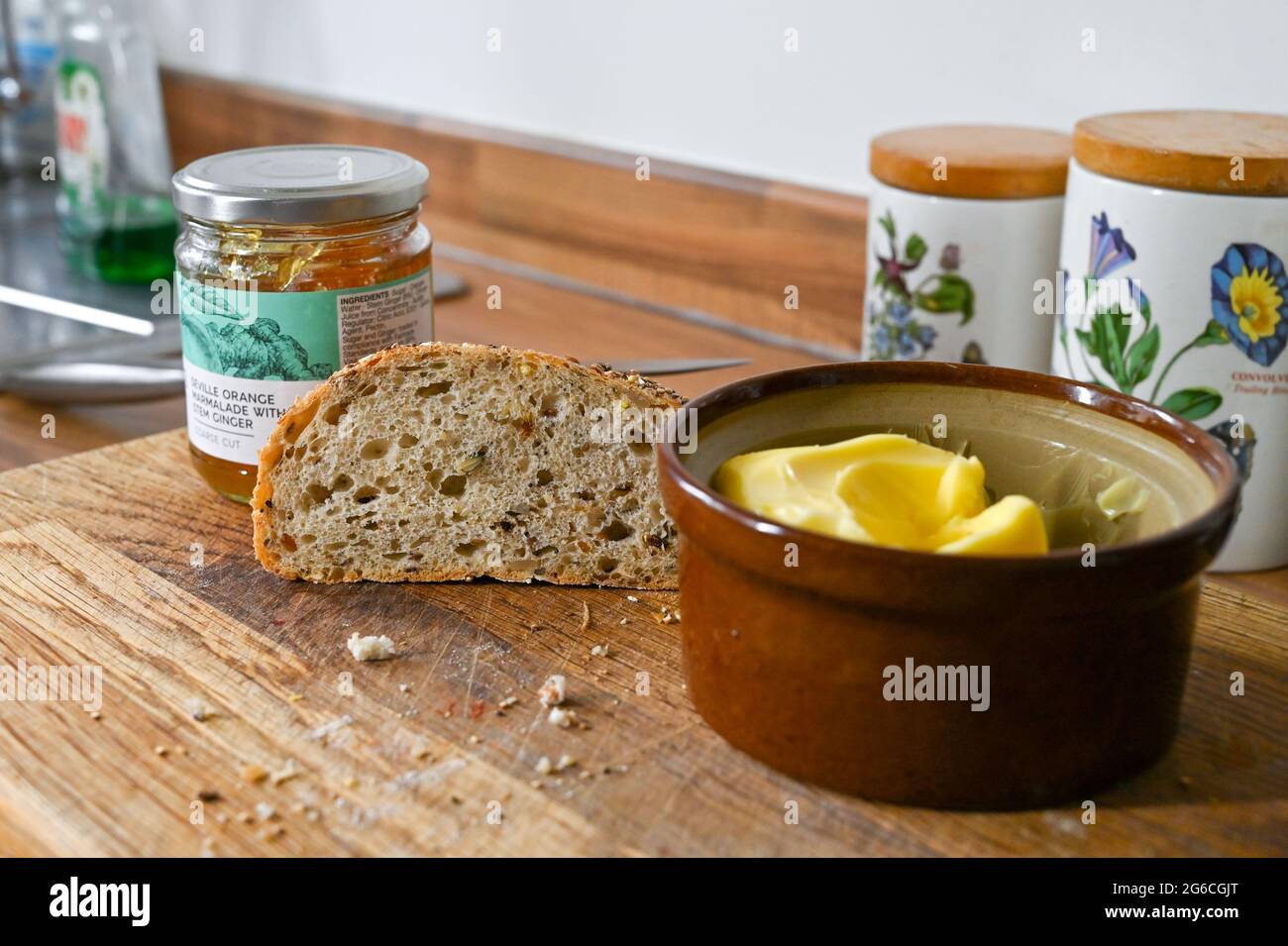 Granary bread with real butter Stock Photo - Alamy
