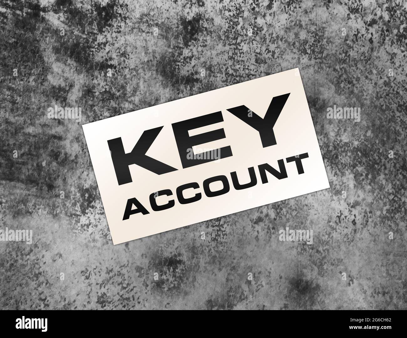 blank card with text KEY ACCOUNT on wooden background. Business concept ...
