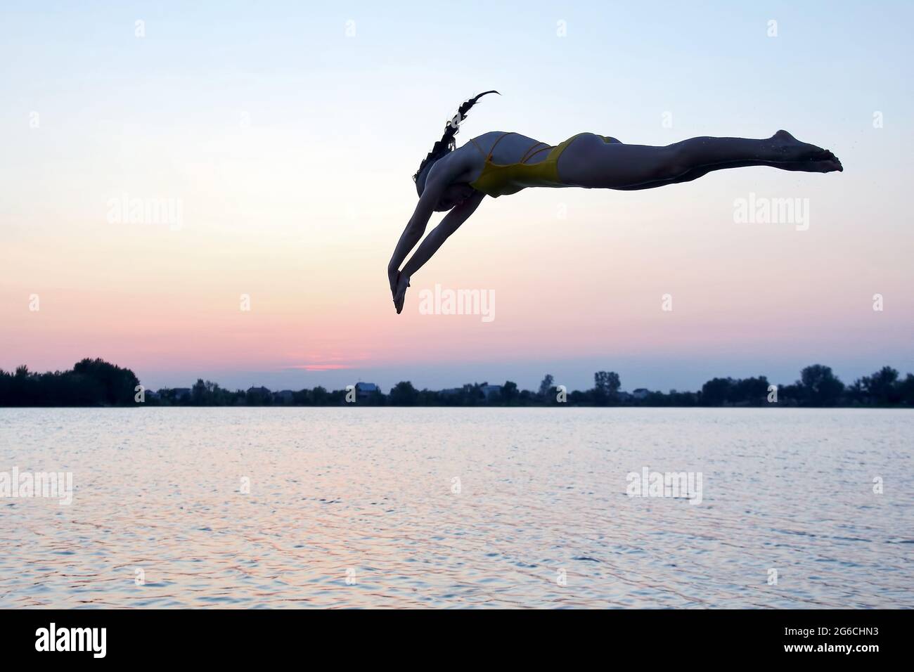 Girl bikini jumping water hi-res stock photography and images - Alamy